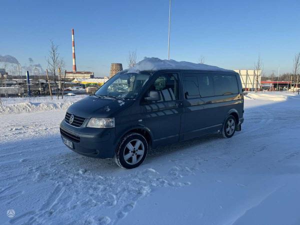 Grey Volkswagen Caravelle 2007 in Vilnius, with an engine capacity of 2.46 L and mileage of 400 thousand km for 4999 €, photo 1 on AUTOMOTO.COM.LV