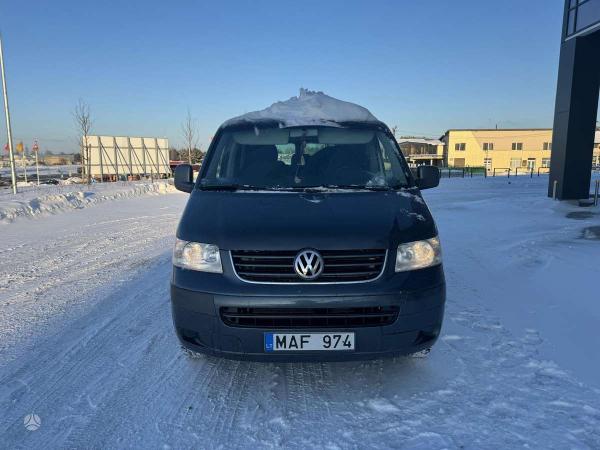 Grey Volkswagen Caravelle 2007 in Vilnius, with an engine capacity of 2.46 L and mileage of 400 thousand km for 4999 €, photo 2 on AUTOMOTO.COM.LV