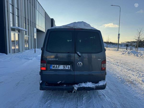 Grey Volkswagen Caravelle 2007 in Vilnius, with an engine capacity of 2.46 L and mileage of 400 thousand km for 4999 €, photo 5 on AUTOMOTO.COM.LV