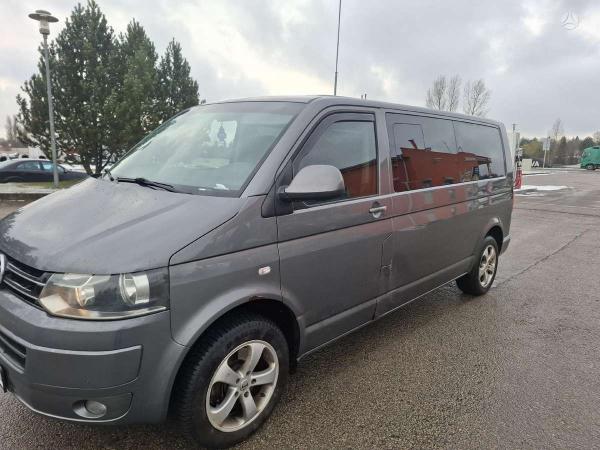 Grey Volkswagen Caravelle 2012 in Panevezys, with an engine capacity of 1.97 L and mileage of 211 thousand km for 8500 €, photo 2 on AUTOMOTO.COM.LV