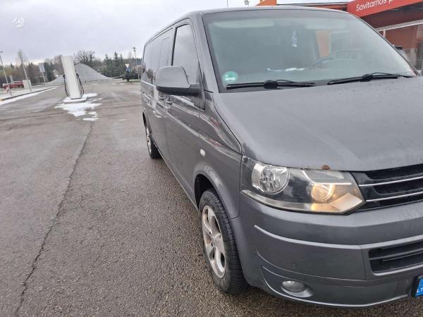 Grey Volkswagen Caravelle 2012 in Panevezys, with an engine capacity of 1.97 L and mileage of 211 thousand km for 8500 €, photo 3 on AUTOMOTO.COM.LV