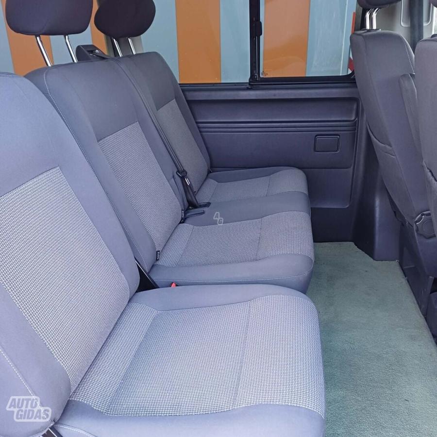 Grey Volkswagen Caravelle 2014 in Kaunas, with an engine capacity of 2.00 L and mileage of 282 thousand km for 13900 €, photo 13 on AUTOMOTO.COM.LV
