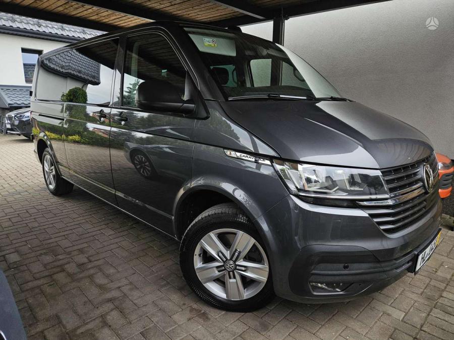 Grey Volkswagen Caravelle 2023 in Radviliskis, with an engine capacity of 1.97 L and mileage of 230 thousand km for 28700 €, photo 1 on AUTOMOTO.COM.LV