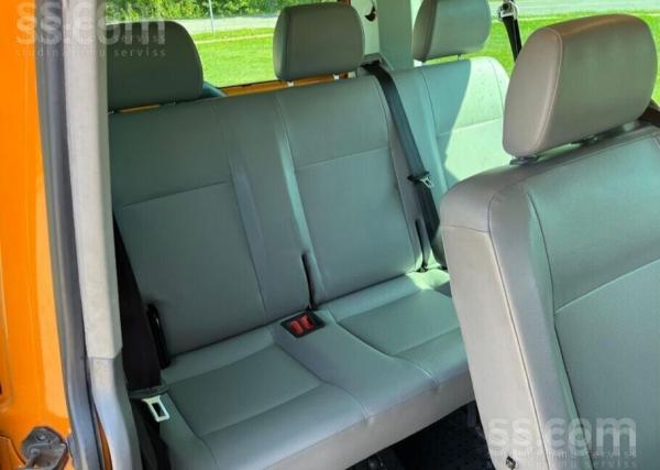 Orange Volkswagen Caravelle 2008 in Riga, with an engine capacity of 1.90 L and mileage of 0 thousand km for 6800 €, photo 4 on AUTOMOTO.COM.LV