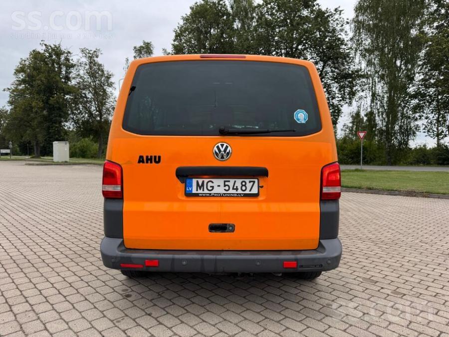 Orange Volkswagen Caravelle 2010 in Riga, with an engine capacity of 2.00 L and mileage of 390 thousand km for 7100 €, photo 5 on AUTOMOTO.COM.LV