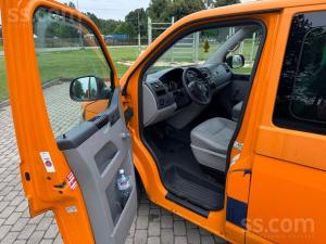 Orange Volkswagen Caravelle 2010 in Riga, with an engine capacity of 2.00 L and mileage of 390 thousand km for 7100 €, photo 6 on AUTOMOTO.COM.LV