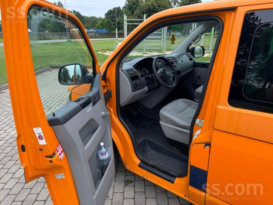 Orange Volkswagen Caravelle 2010 in Riga, with an engine capacity of 2.00 L and mileage of 390 thousand km for 7100 €, photo 6 on AUTOMOTO.COM.LV
