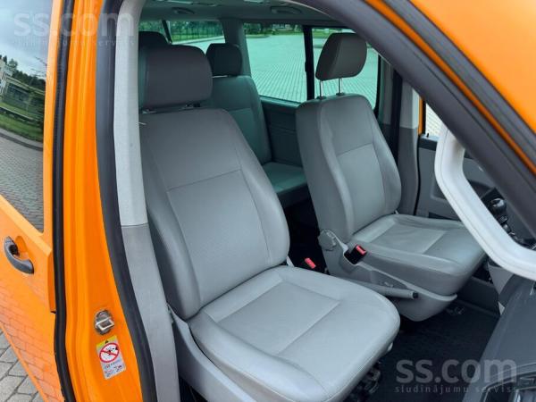 Orange Volkswagen Caravelle 2010 in Riga, with an engine capacity of 2.00 L and mileage of 390 thousand km for 7100 €, photo 7 on AUTOMOTO.COM.LV