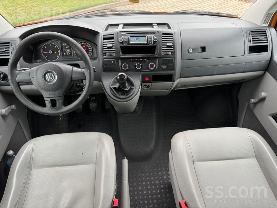 Orange Volkswagen Caravelle 2010 in Riga, with an engine capacity of 2.00 L and mileage of 390 thousand km for 7100 €, photo 10 on AUTOMOTO.COM.LV