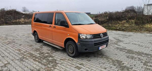 Orange Volkswagen Caravelle 2010 in Kaunas, with an engine capacity of 1.97 L and mileage of 330 thousand km for 7950 €, photo 5 on AUTOMOTO.COM.LV