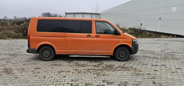Orange Volkswagen Caravelle 2010 in Kaunas, with an engine capacity of 1.97 L and mileage of 330 thousand km for 7950 €, photo 6 on AUTOMOTO.COM.LV