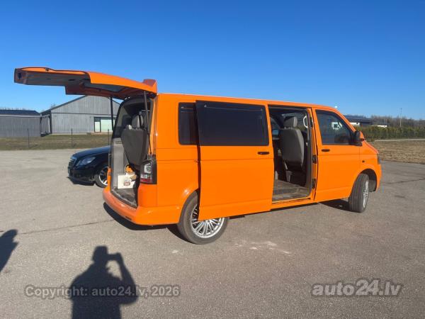 Oranžs Volkswagen Caravelle 2007 Tallina, ar dzinēja tilpumu 1.90 L un nobraukumu 476 tūkst. km par 8800 €, foto 3 vietnē AUTOMOTO.COM.LV