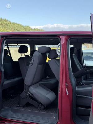 Red Volkswagen Caravelle 2010 in Kaunas, with an engine capacity of 1.97 L and mileage of 274 thousand km for 10600 €, photo 5 on AUTOMOTO.COM.LV
