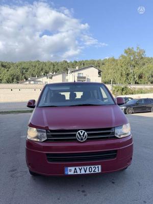 Red Volkswagen Caravelle 2010 in Kaunas, with an engine capacity of 1.97 L and mileage of 274 thousand km for 10600 €, photo 10 on AUTOMOTO.COM.LV