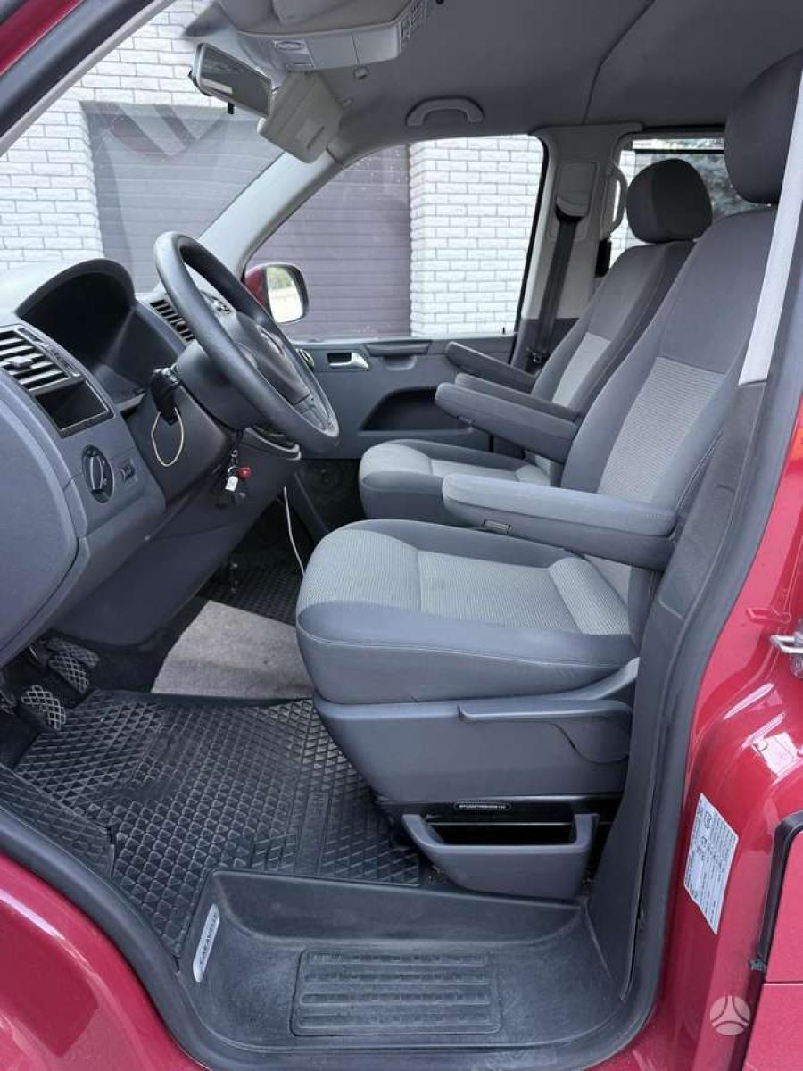 Red Volkswagen Caravelle 2010 in Kaunas, with an engine capacity of 1.97 L and mileage of 274 thousand km for 10600 €, photo 13 on AUTOMOTO.COM.LV