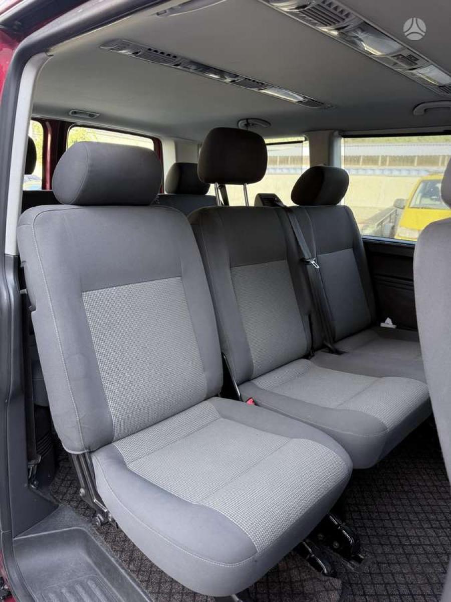 Red Volkswagen Caravelle 2010 in Kaunas, with an engine capacity of 1.97 L and mileage of 274 thousand km for 10600 €, photo 20 on AUTOMOTO.COM.LV