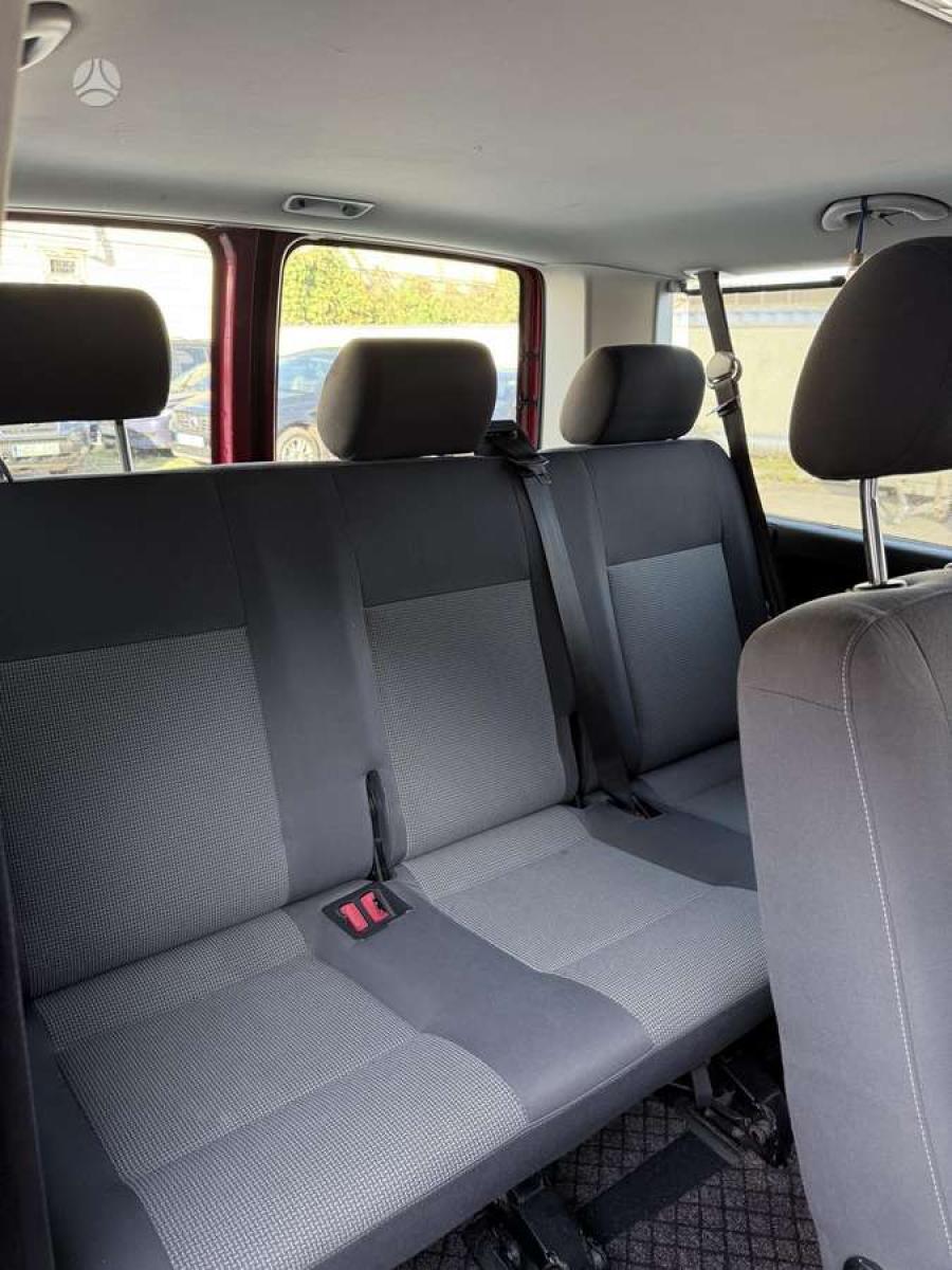 Red Volkswagen Caravelle 2010 in Kaunas, with an engine capacity of 1.97 L and mileage of 274 thousand km for 10600 €, photo 21 on AUTOMOTO.COM.LV