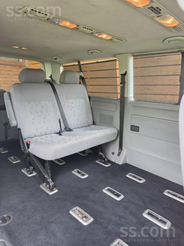 Red Volkswagen Caravelle 2007 in Riga, with an engine capacity of 2.50 L and mileage of 395 thousand km for 3990 €, photo 8 on AUTOMOTO.COM.LV