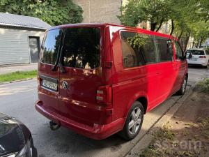 Sarkans Volkswagen Caravelle 2010 Rīga, ar dzinēja tilpumu 2.00 L un nobraukumu 428 tūkst. km par 9500 €, foto 5 vietnē AUTOMOTO.COM.LV