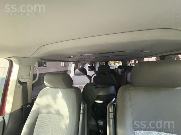 Red Volkswagen Caravelle 2010 in Riga, with an engine capacity of 2.00 L and mileage of 428 thousand km for 9500 €, photo 8 on AUTOMOTO.COM.LV