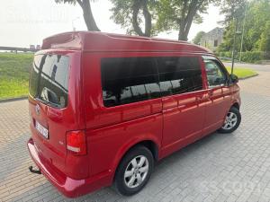 Sarkans Volkswagen Caravelle 2011 Daugavpils, ar dzinēja tilpumu 2.00 L un nobraukumu 289 tūkst. km par 9850 €, foto 5 vietnē AUTOMOTO.COM.LV