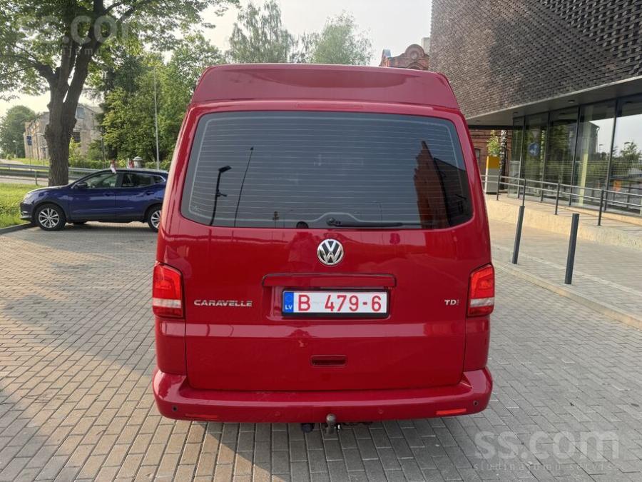 Sarkans Volkswagen Caravelle 2011 Daugavpils, ar dzinēja tilpumu 2.00 L un nobraukumu 289 tūkst. km par 9850 €, foto 7 vietnē AUTOMOTO.COM.LV