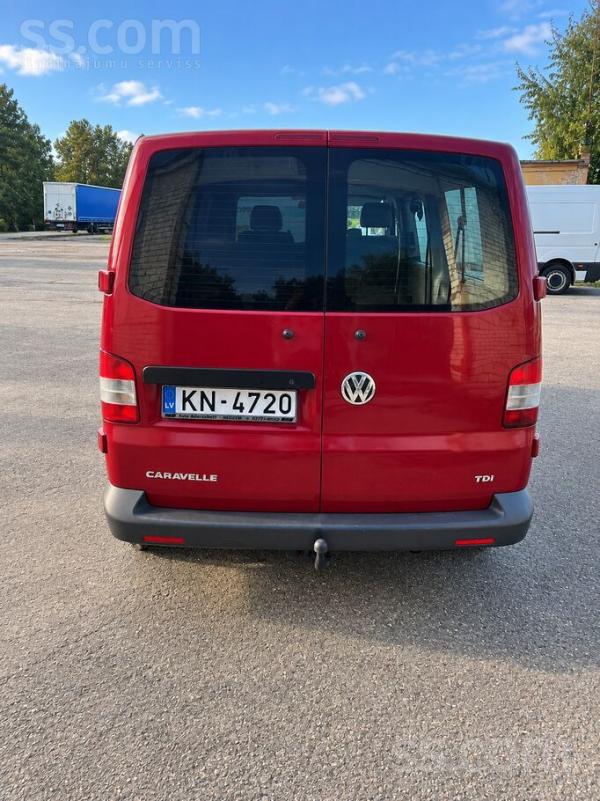 Red Volkswagen Caravelle 2012 in Riga, with an engine capacity of 1.90 L and mileage of 0 thousand km for 8500 €, photo 4 on AUTOMOTO.COM.LV