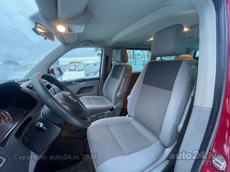 Red Volkswagen Caravelle 2015 in Tallinn, with an engine capacity of 2.00 L and mileage of 263 thousand km for 13500 €, photo 9 on AUTOMOTO.COM.LV