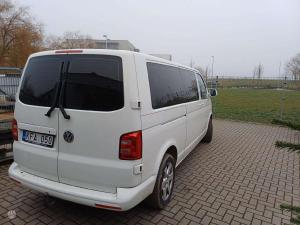 White Volkswagen Caravelle 2013 in Jonava, with an engine capacity of 1.97 L and mileage of 392 thousand km for 10800 €, photo 5 on AUTOMOTO.COM.LV