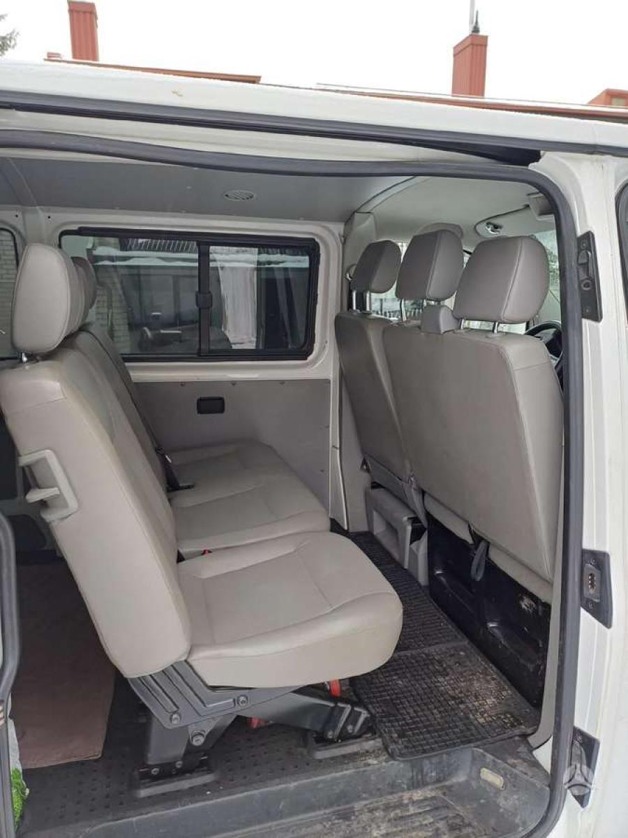 White Volkswagen Caravelle 2013 in Jonava, with an engine capacity of 1.97 L and mileage of 392 thousand km for 10800 €, photo 10 on AUTOMOTO.COM.LV