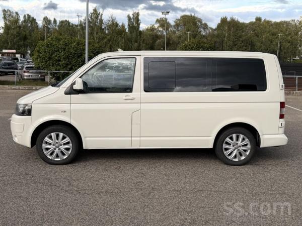 White Volkswagen Caravelle 2008 in Riga, with an engine capacity of 1.90 L and mileage of 265 thousand km for 10900 €, photo 3 on AUTOMOTO.COM.LV