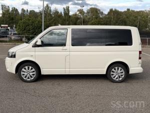White Volkswagen Caravelle 2008 in Riga, with an engine capacity of 1.90 L and mileage of 265 thousand km for 10900 €, photo 3 on AUTOMOTO.COM.LV