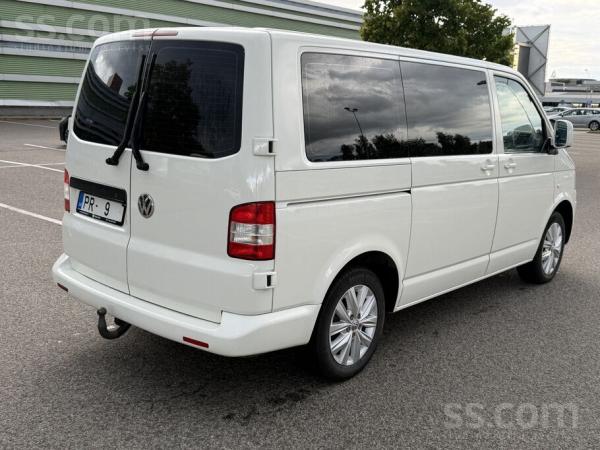 White Volkswagen Caravelle 2008 in Riga, with an engine capacity of 1.90 L and mileage of 265 thousand km for 10900 €, photo 6 on AUTOMOTO.COM.LV