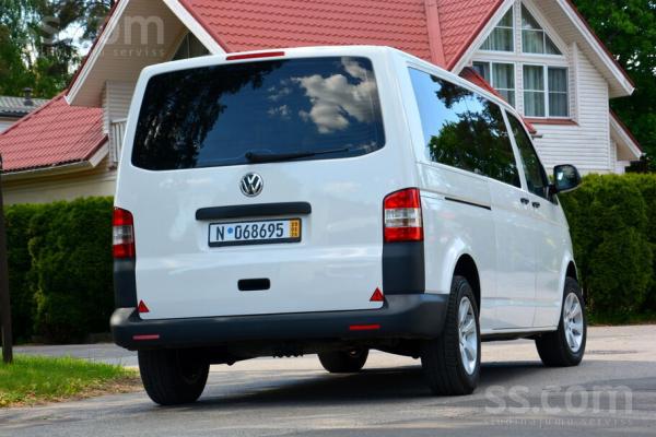 White Volkswagen Caravelle 2011 in Riga, with an engine capacity of 2.00 L and mileage of 305 thousand km for 10499 €, photo 5 on AUTOMOTO.COM.LV