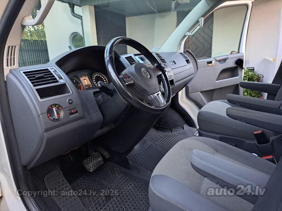White Volkswagen Caravelle 2013 in Tallinn, with an engine capacity of 2.00 L and mileage of 310 thousand km for 10950 €, photo 12 on AUTOMOTO.COM.LV