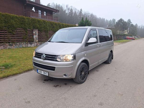 Yellow Volkswagen Caravelle 2011 in Vilnius, with an engine capacity of 1.98 L and mileage of 240 thousand km for 11500 €, photo 2 on AUTOMOTO.COM.LV