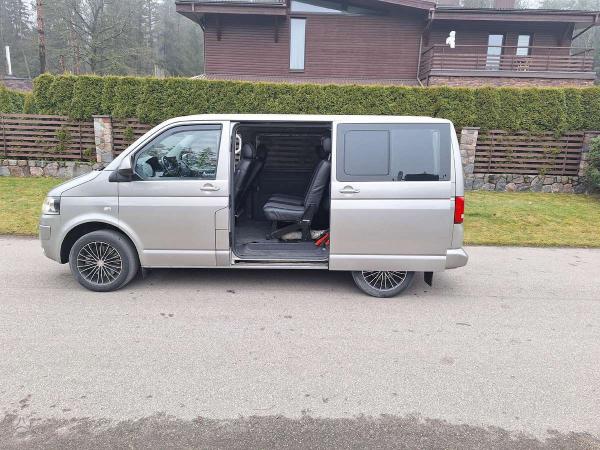 Yellow Volkswagen Caravelle 2011 in Vilnius, with an engine capacity of 1.98 L and mileage of 240 thousand km for 11500 €, photo 3 on AUTOMOTO.COM.LV