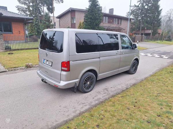 Yellow Volkswagen Caravelle 2011 in Vilnius, with an engine capacity of 1.98 L and mileage of 240 thousand km for 11500 €, photo 6 on AUTOMOTO.COM.LV