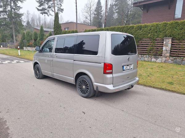 Yellow Volkswagen Caravelle 2011 in Vilnius, with an engine capacity of 1.98 L and mileage of 240 thousand km for 11500 €, photo 9 on AUTOMOTO.COM.LV
