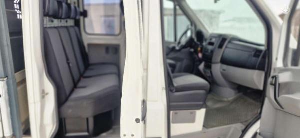 White Volkswagen Crafter 2012 in Kelme, with an engine capacity of 1.97 L and mileage of 210 thousand km for 10800 €, photo 8 on AUTOMOTO.COM.LV