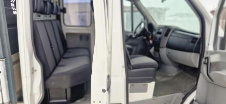 White Volkswagen Crafter 2012 in Kelme, with an engine capacity of 1.97 L and mileage of 210 thousand km for 10800 €, photo 8 on AUTOMOTO.COM.LV