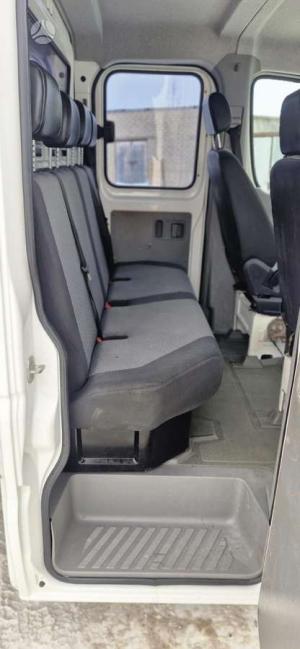 White Volkswagen Crafter 2012 in Kelme, with an engine capacity of 1.97 L and mileage of 210 thousand km for 10800 €, photo 12 on AUTOMOTO.COM.LV