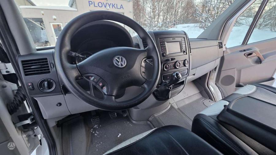 White Volkswagen Crafter 2015 in Klaipeda, with an engine capacity of 2.00 L and mileage of 231 thousand km for 11890 €, photo 13 on AUTOMOTO.COM.LV