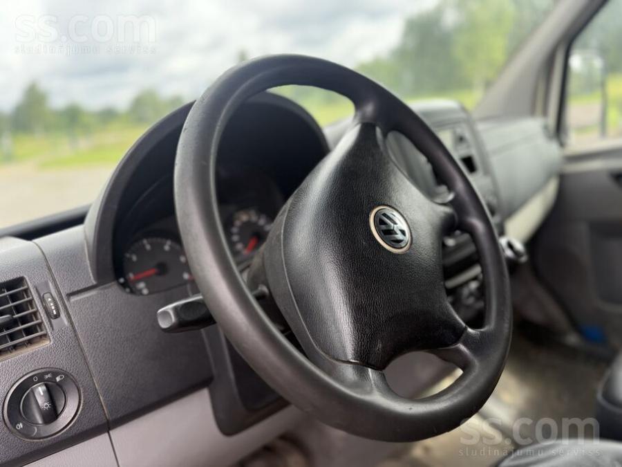 White Volkswagen Crafter 2013 in Riga, with an engine capacity of 2.00 L and mileage of 343 thousand km for 6950 €, photo 8 on AUTOMOTO.COM.LV