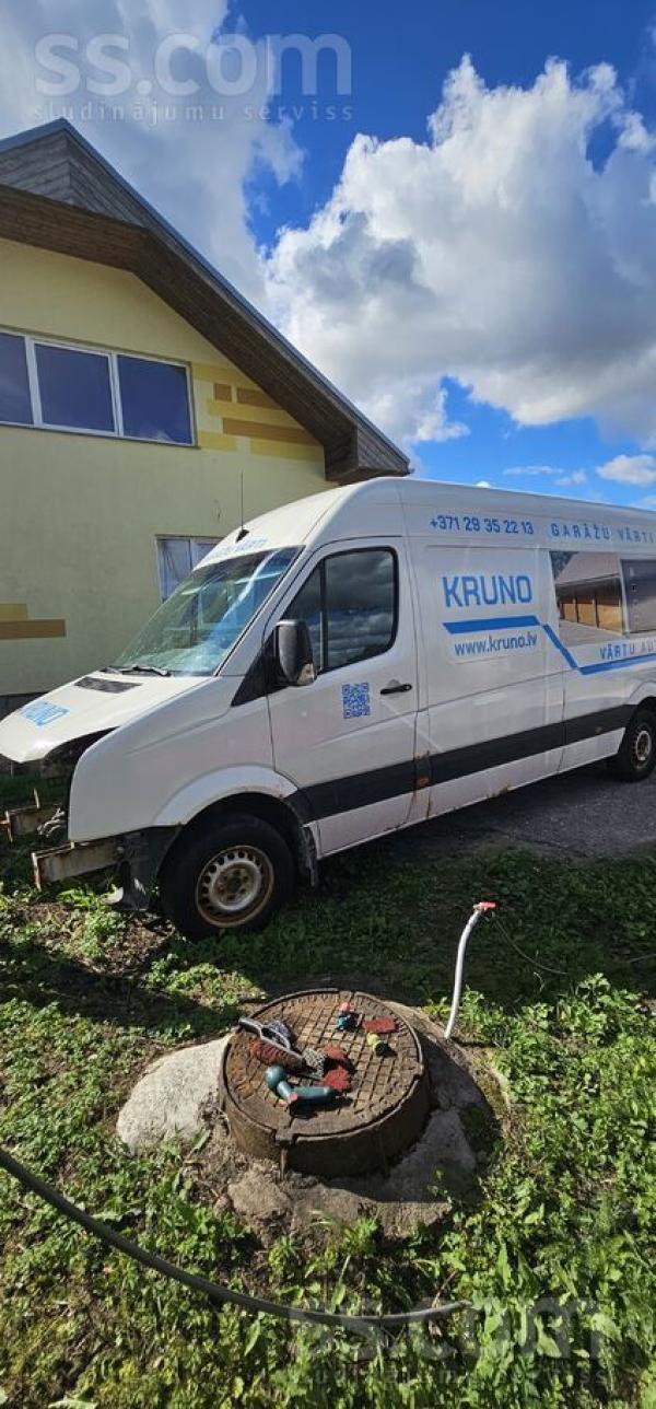 White Volkswagen Crafter 2013 in Riga, with an engine capacity of 2.00 L and mileage of 450 thousand km for 2000 €, photo 9 on AUTOMOTO.COM.LV