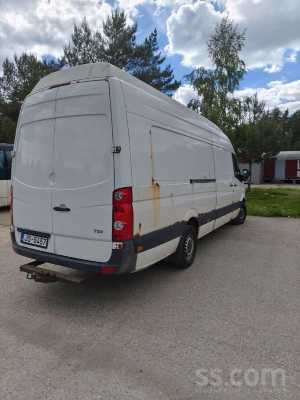 White Volkswagen Crafter 2014 in Jekabpils, with an engine capacity of 2.00 L and mileage of 336 thousand km for 6500 €, photo 3 on AUTOMOTO.COM.LV