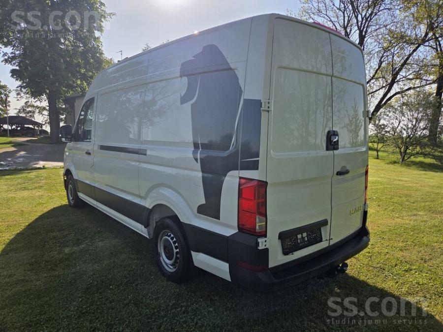 White Volkswagen Crafter 2017 in Dobele, with an engine capacity of 2.00 L and mileage of 255 thousand km for 13995 €, photo 3 on AUTOMOTO.COM.LV