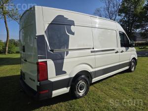 White Volkswagen Crafter 2017 in Dobele, with an engine capacity of 2.00 L and mileage of 255 thousand km for 13995 €, photo 4 on AUTOMOTO.COM.LV