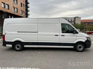White Volkswagen Crafter 2024 in Riga, with an engine capacity of 2.00 L and mileage of 77 thousand km for 34700 €, photo 5 on AUTOMOTO.COM.LV