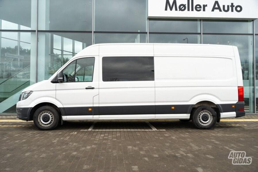 White Volkswagen Crafter 2019 in Vilnius, with an engine capacity of 2.00 L and mileage of 169 thousand km for 23950 €, photo 2 on AUTOMOTO.COM.LV